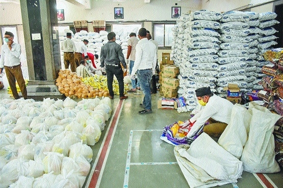 RSS workers distributing daily 1.3 lakh food packets in Delhi - The ...
