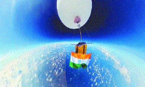 Attached to a helium balloon, Indian tricolour flutters at edge of ...